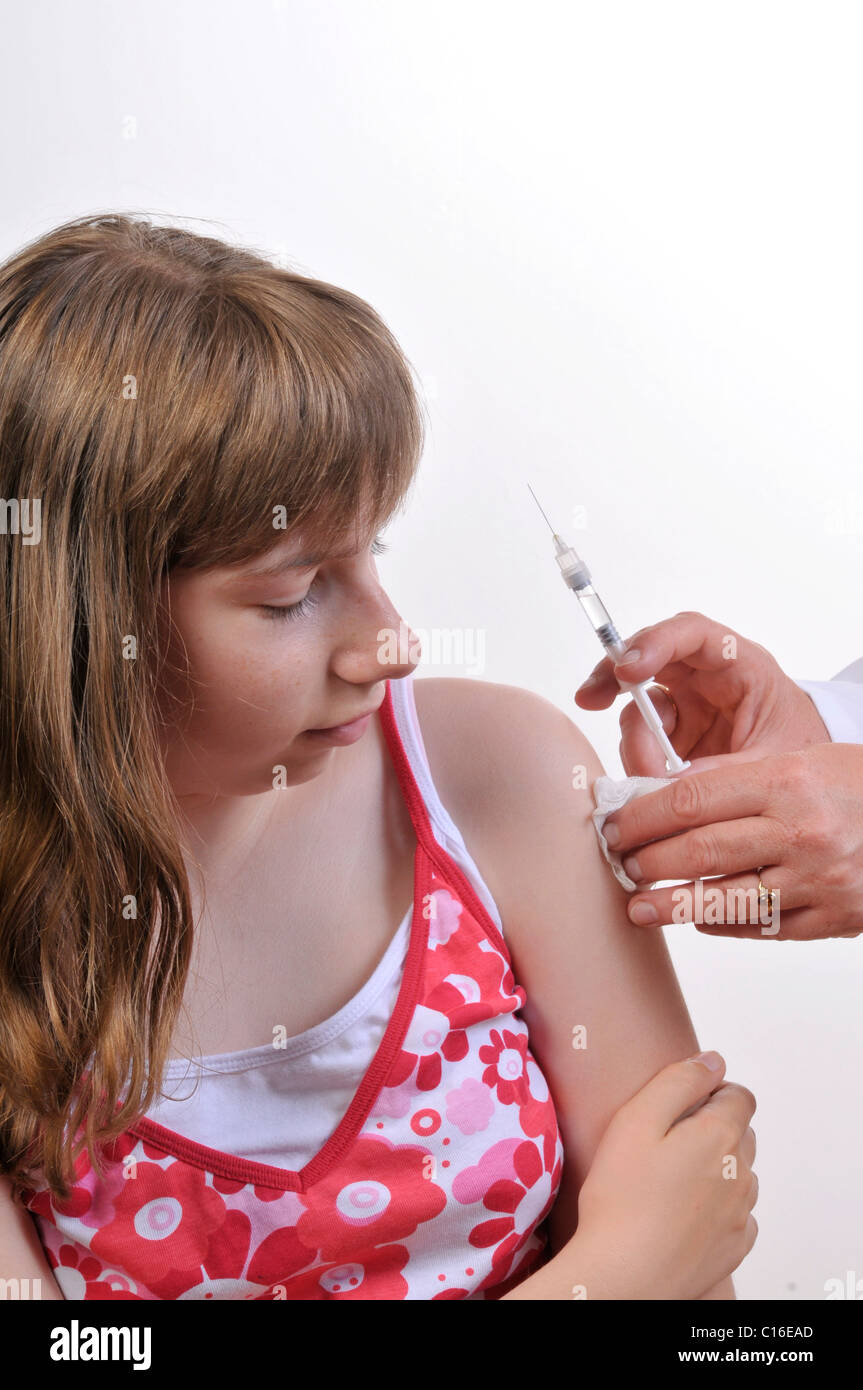 Adolescent getting an injection Stock Photo - Alamy
