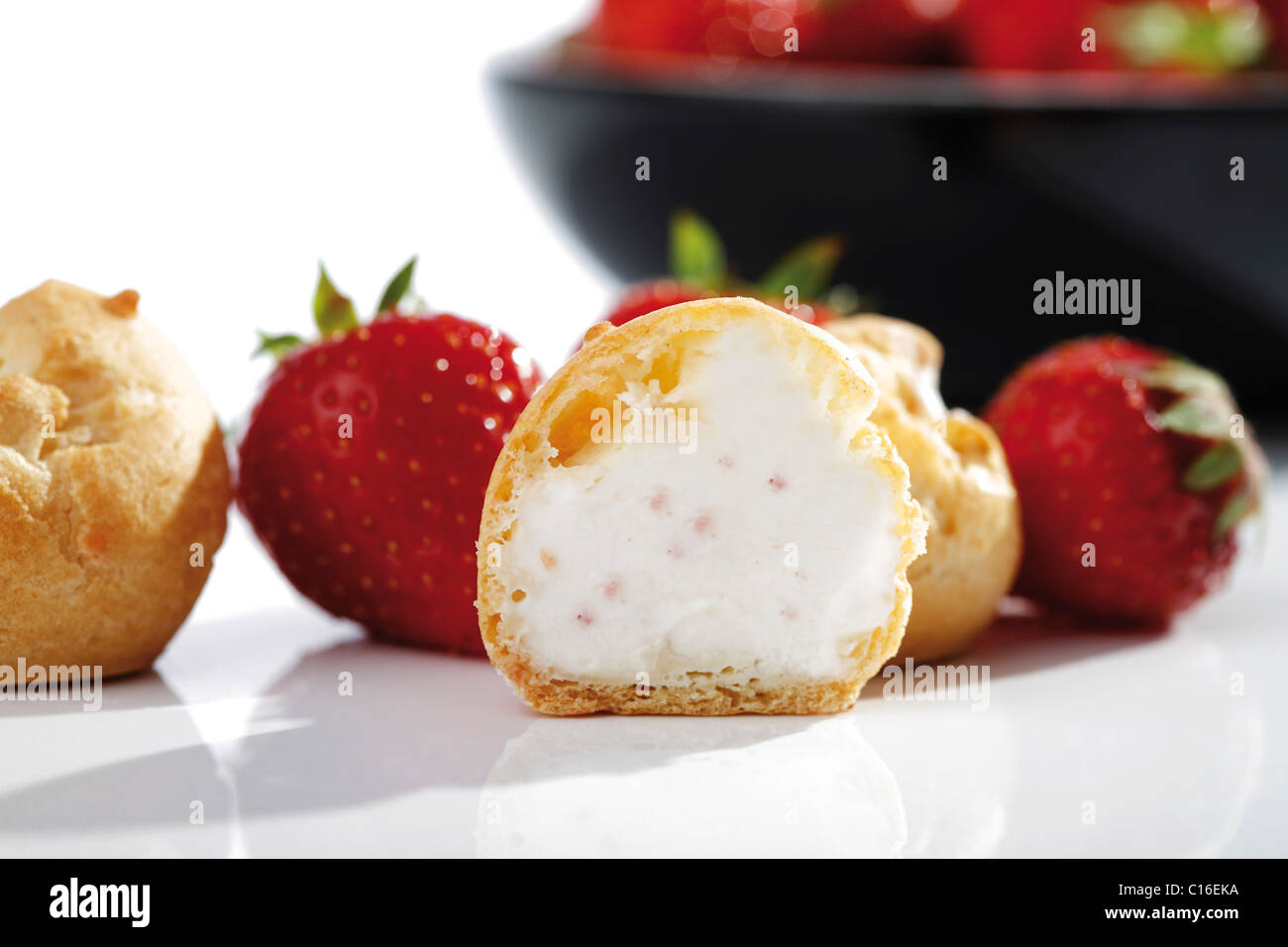 Strawberry cream puffs with strawberries Stock Photo - Alamy