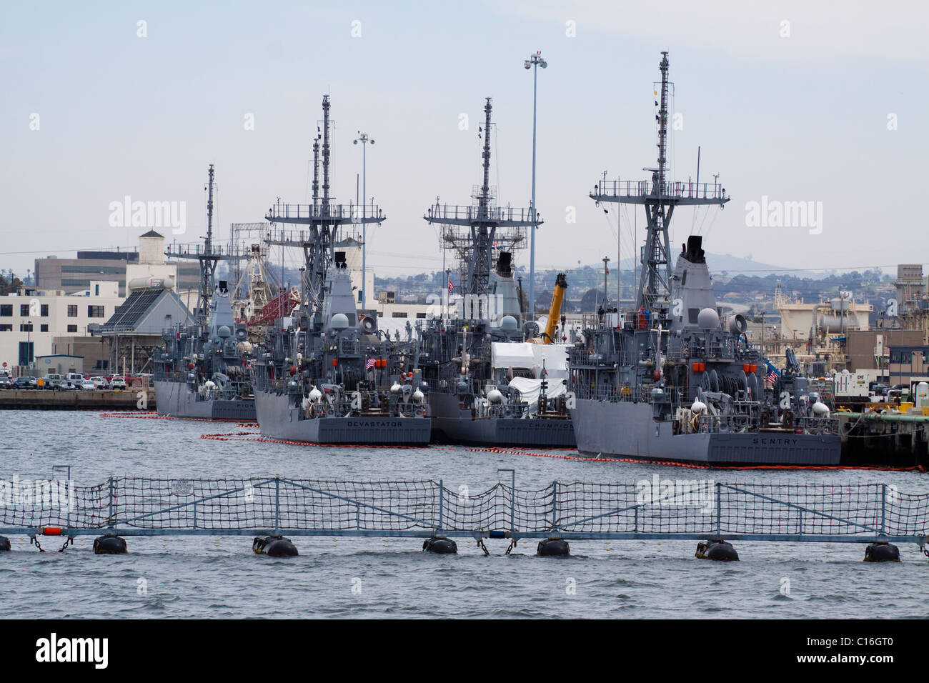 United States Navy minesweeper ships docked in naval base shipyard in ...