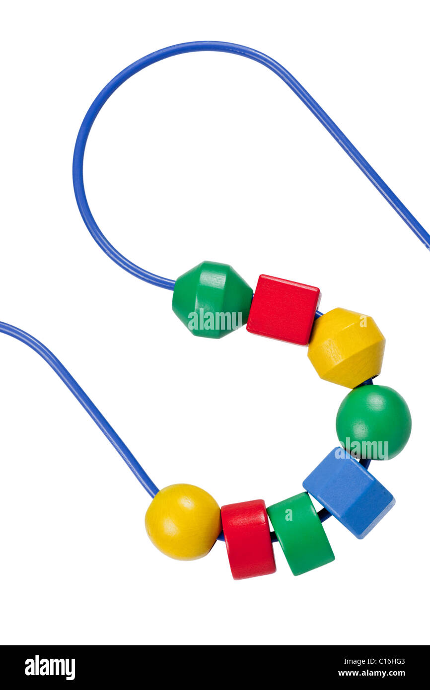 Colorful bead and wire toy with different shapes isolated on white ...