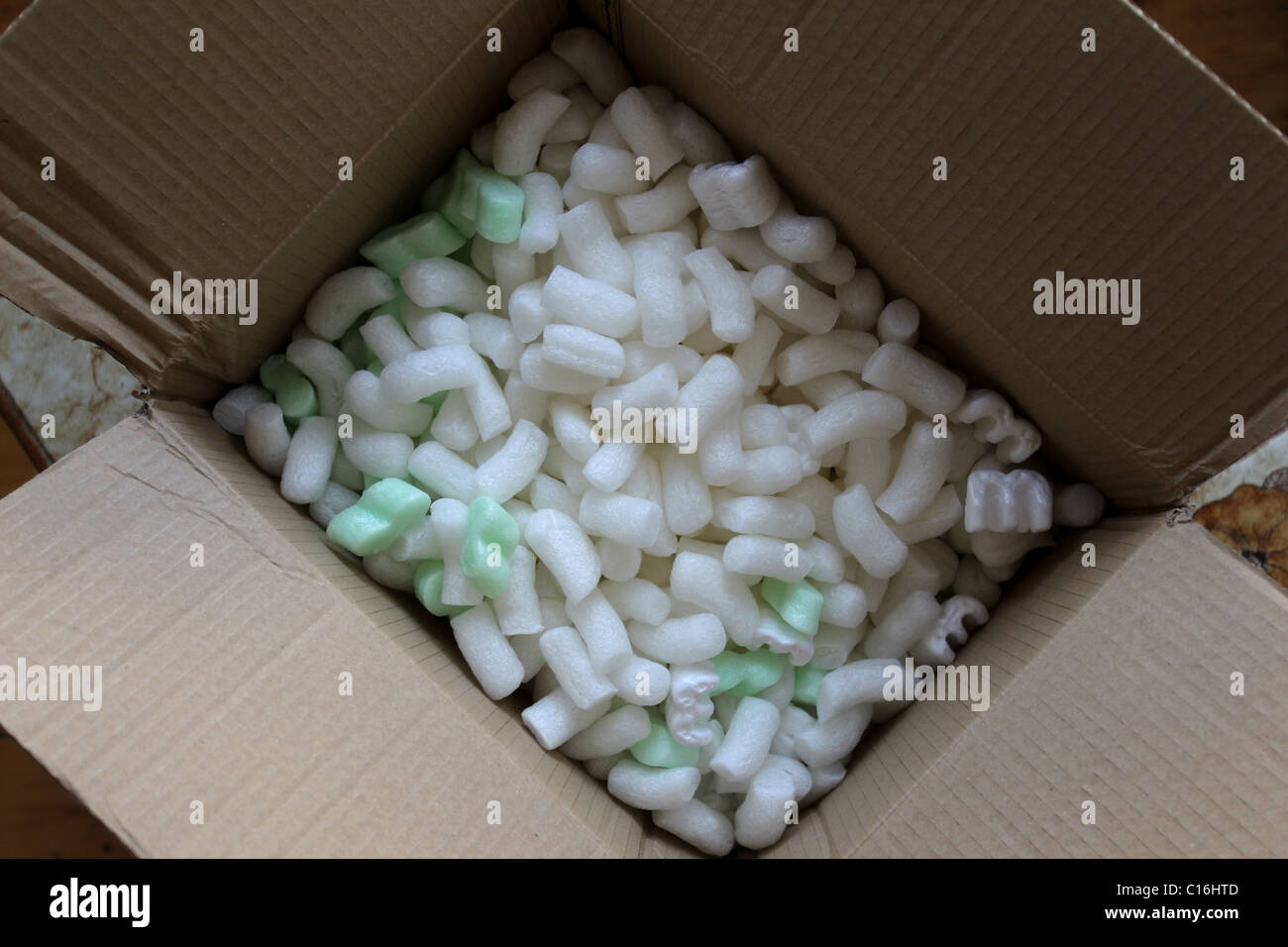 Packing materials inside a cardboard box in a flat in Hove, East Sussex ...