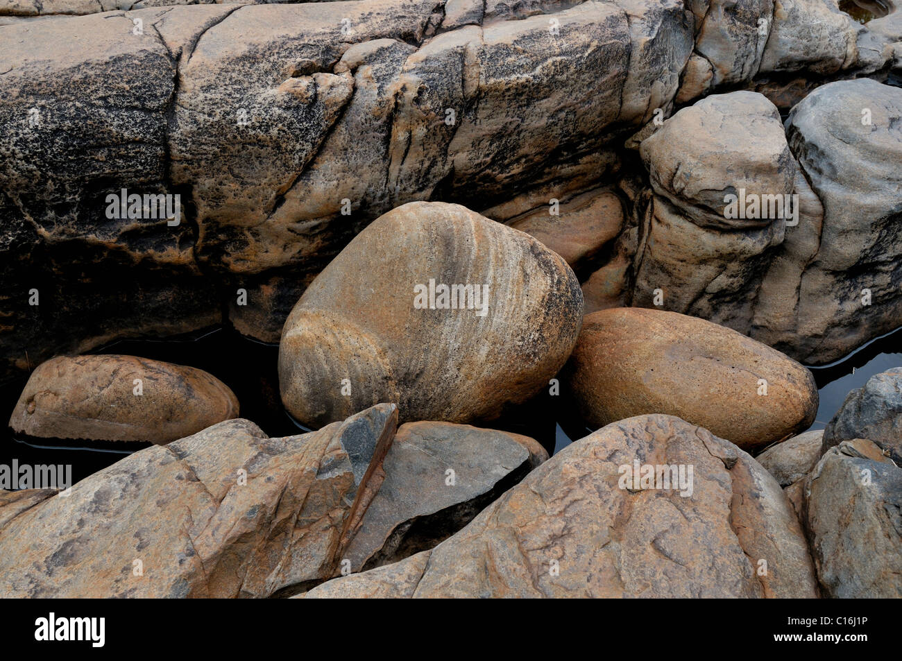 Rocks formations polished by water Stock Photo - Alamy
