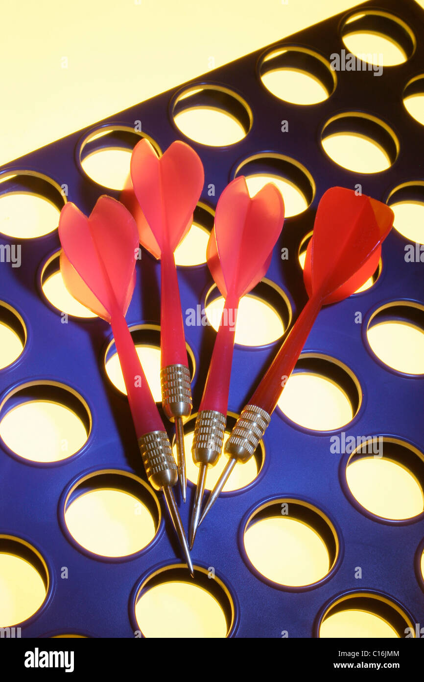 Four darts hi-res stock photography and images - Alamy