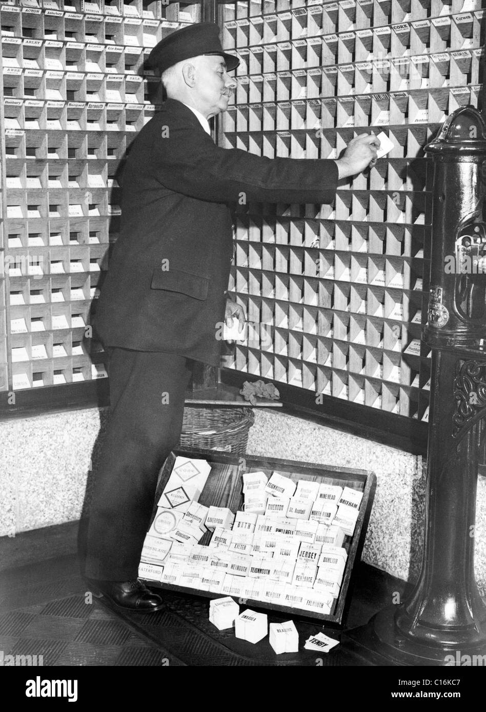 Historic photograph, man delivering mail Stock Photo - Alamy