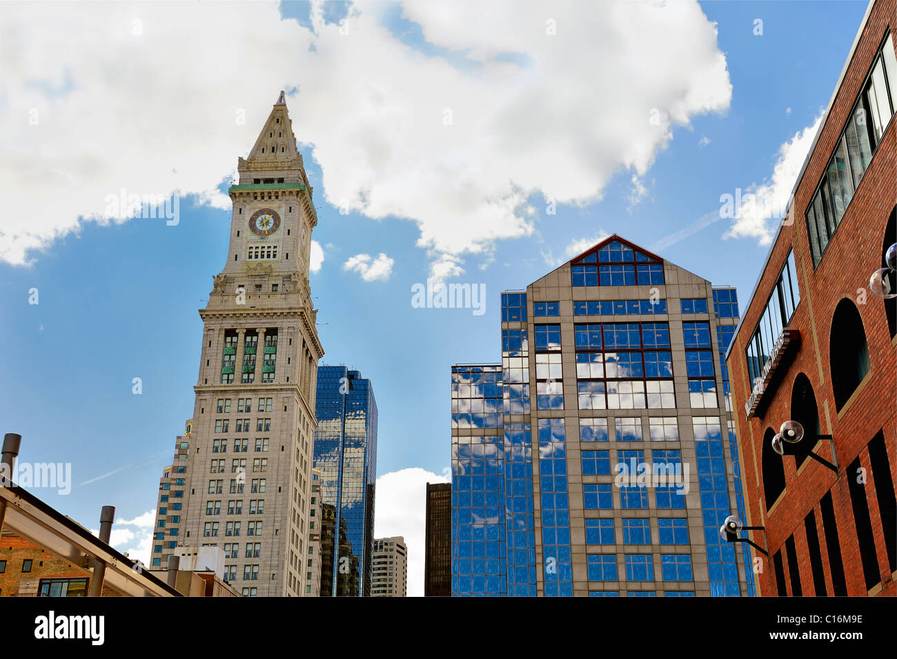 Boston Custom House, a Skyscraper reflecting blue sky and cumulus ...