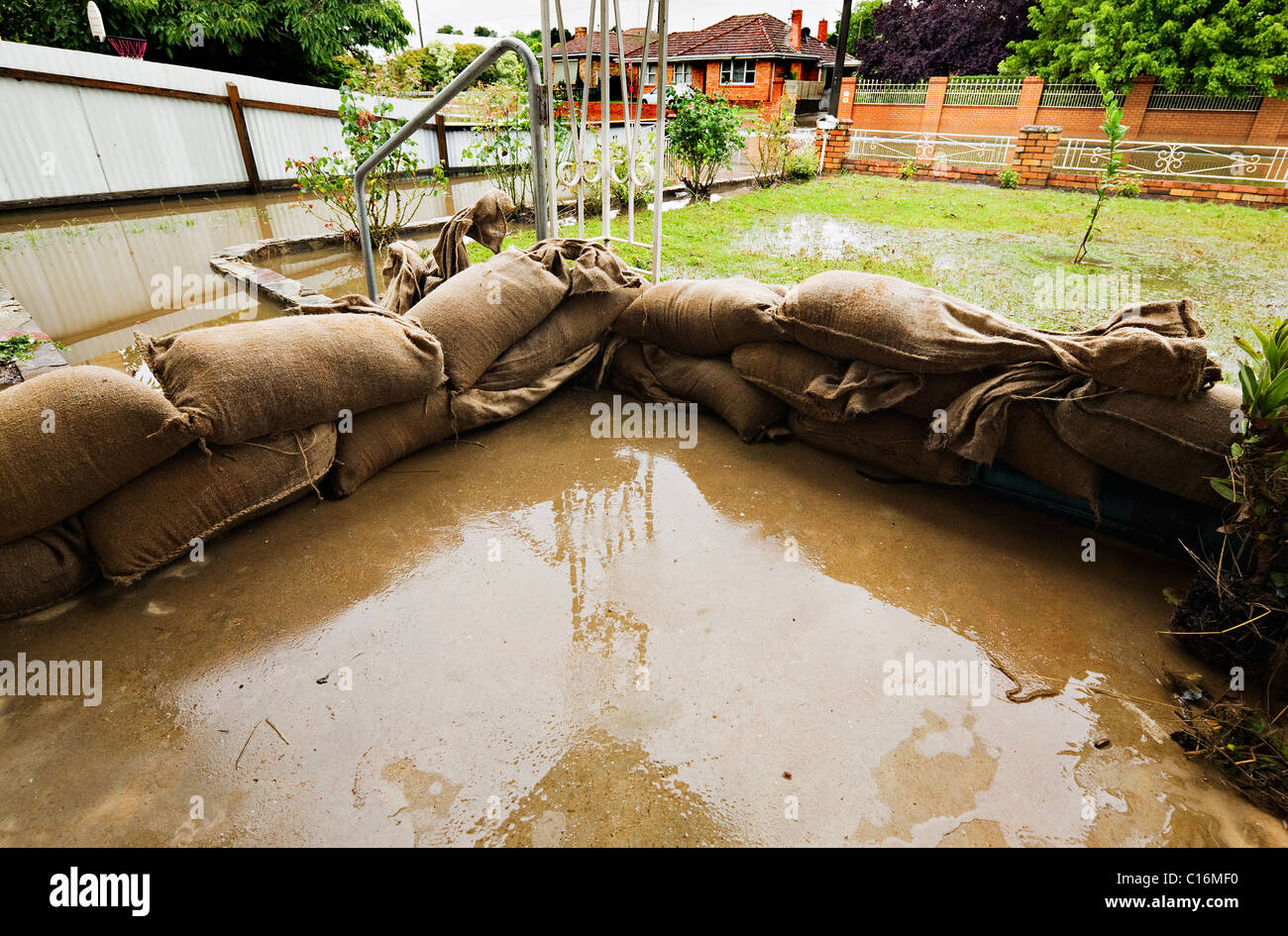 A sandbagged property after flash flooding water rises and inundates ...