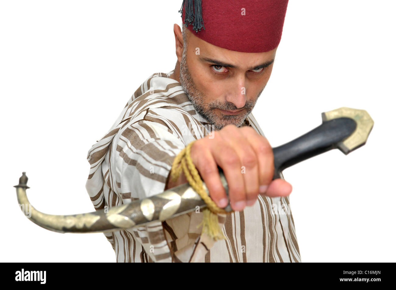 Arabic man with a dagger isolated in white Stock Photo - Alamy