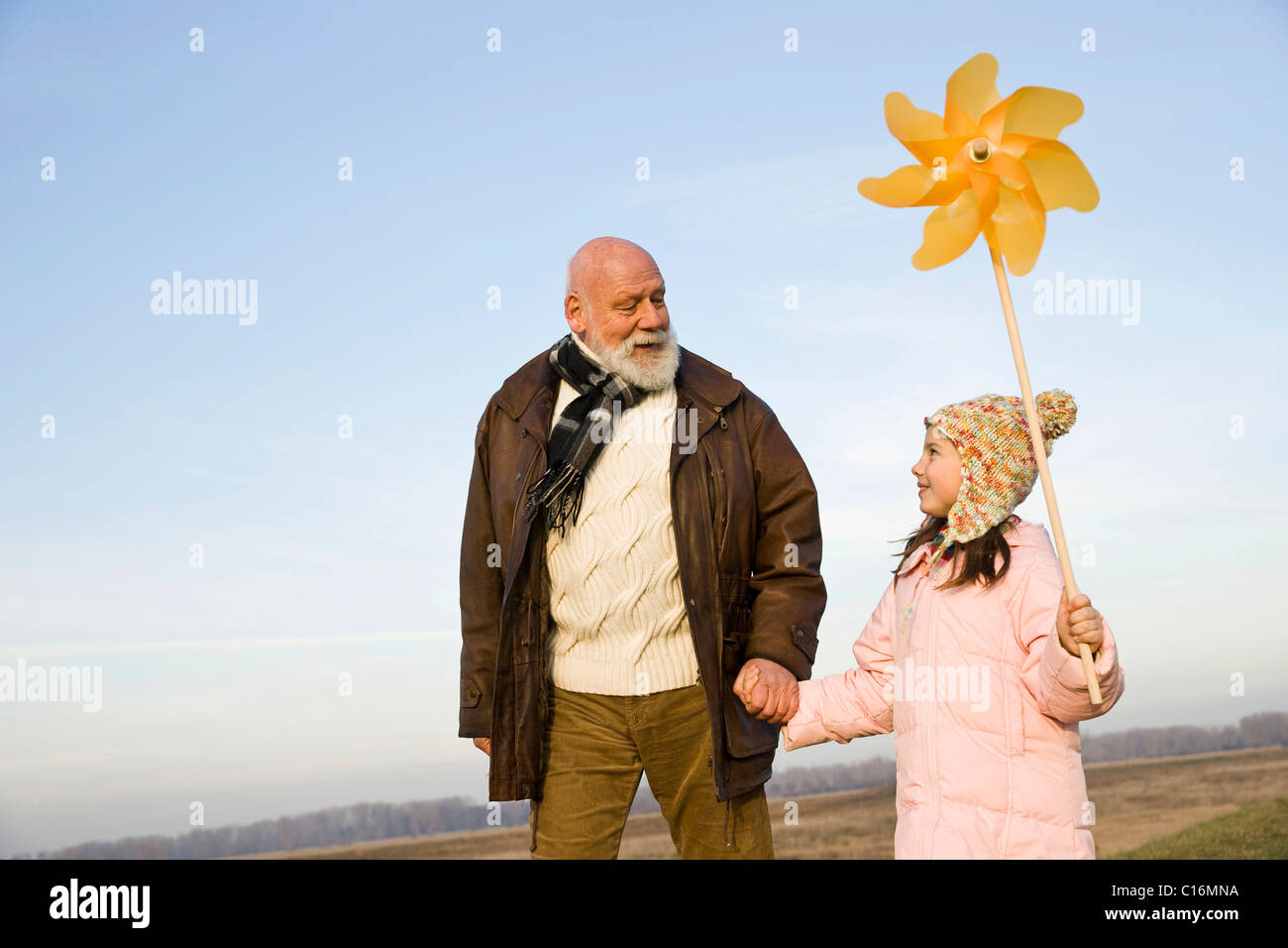 Girl with a pinwheel hi-res stock photography and images - Alamy