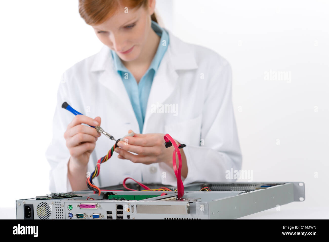 Female support computer engineer - IT woman repair defect Stock Photo ...