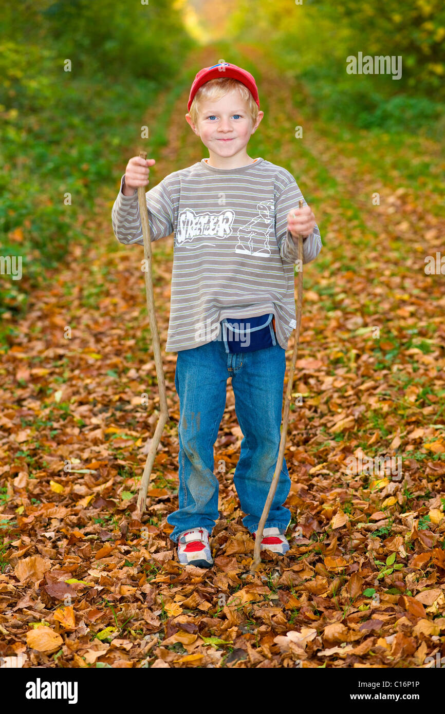Old people walking with sticks hi-res stock photography and images - Alamy