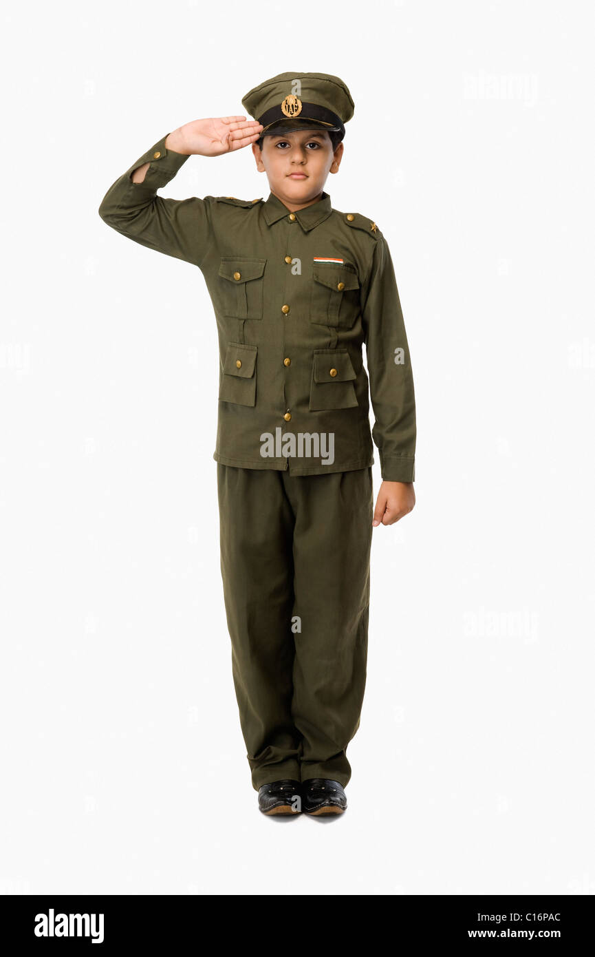 Portrait of a boy saluting in police uniform Stock Photo - Alamy