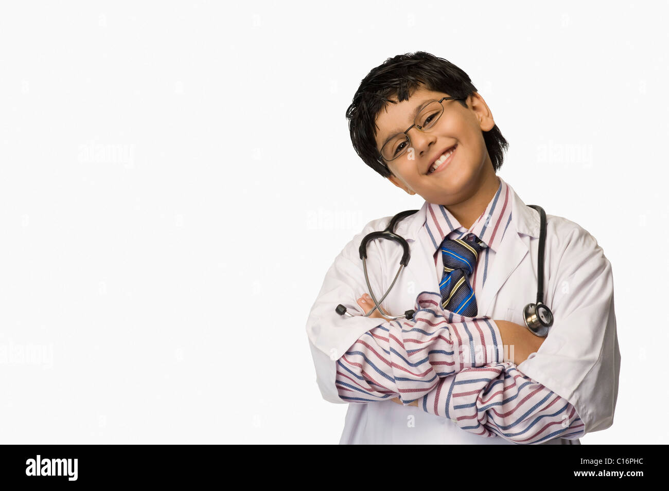 Boy smiling in a lab coat Stock Photo - Alamy