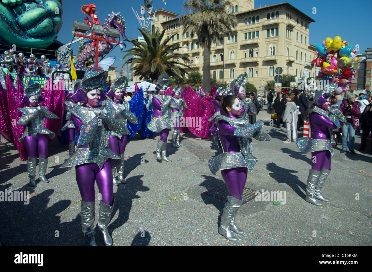 VIAREGGIO, ITALY - MARCH 6: group of masked people dancing the famous ...