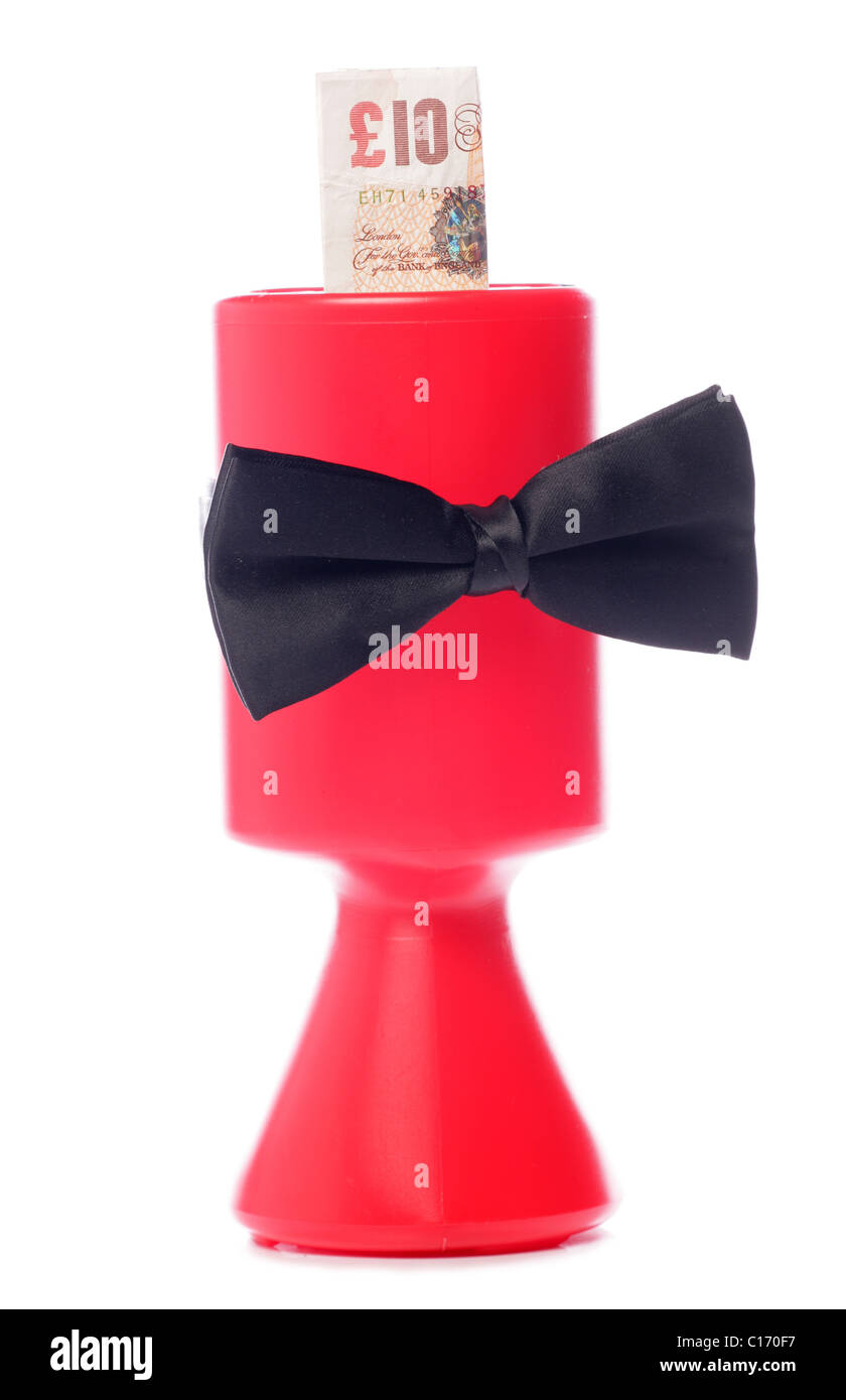 Black bow tie charity donation with ten pounds studio cutout Stock ...