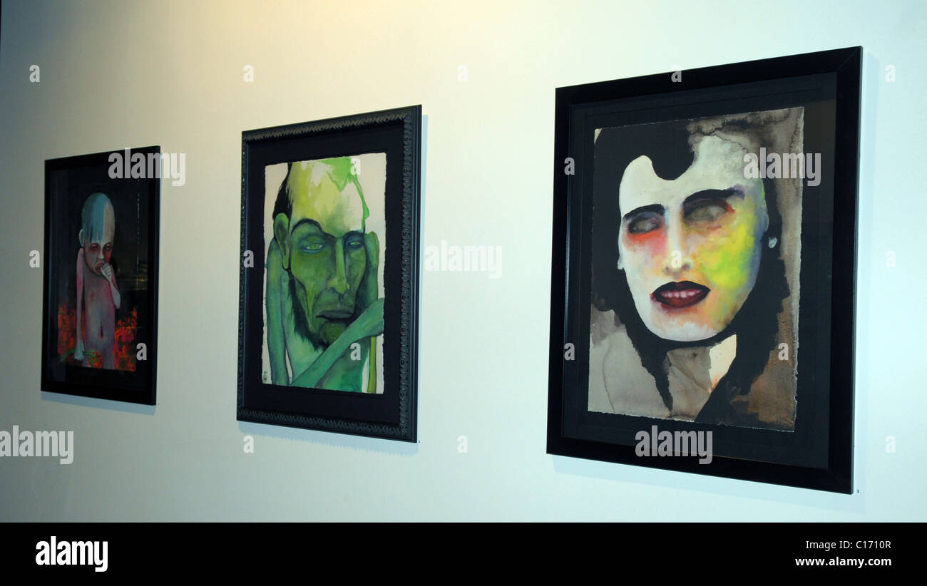 Marilyn Manson displays some of his art work at the 101 Exhibit Gallery ...