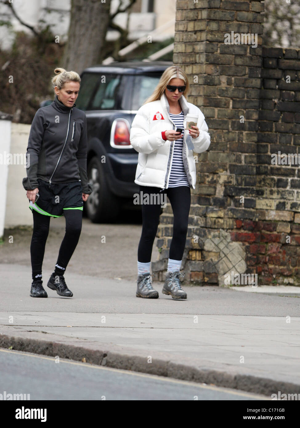 Denise Van Outen goes for a power walk with her trainer, Nicki Waterman ...