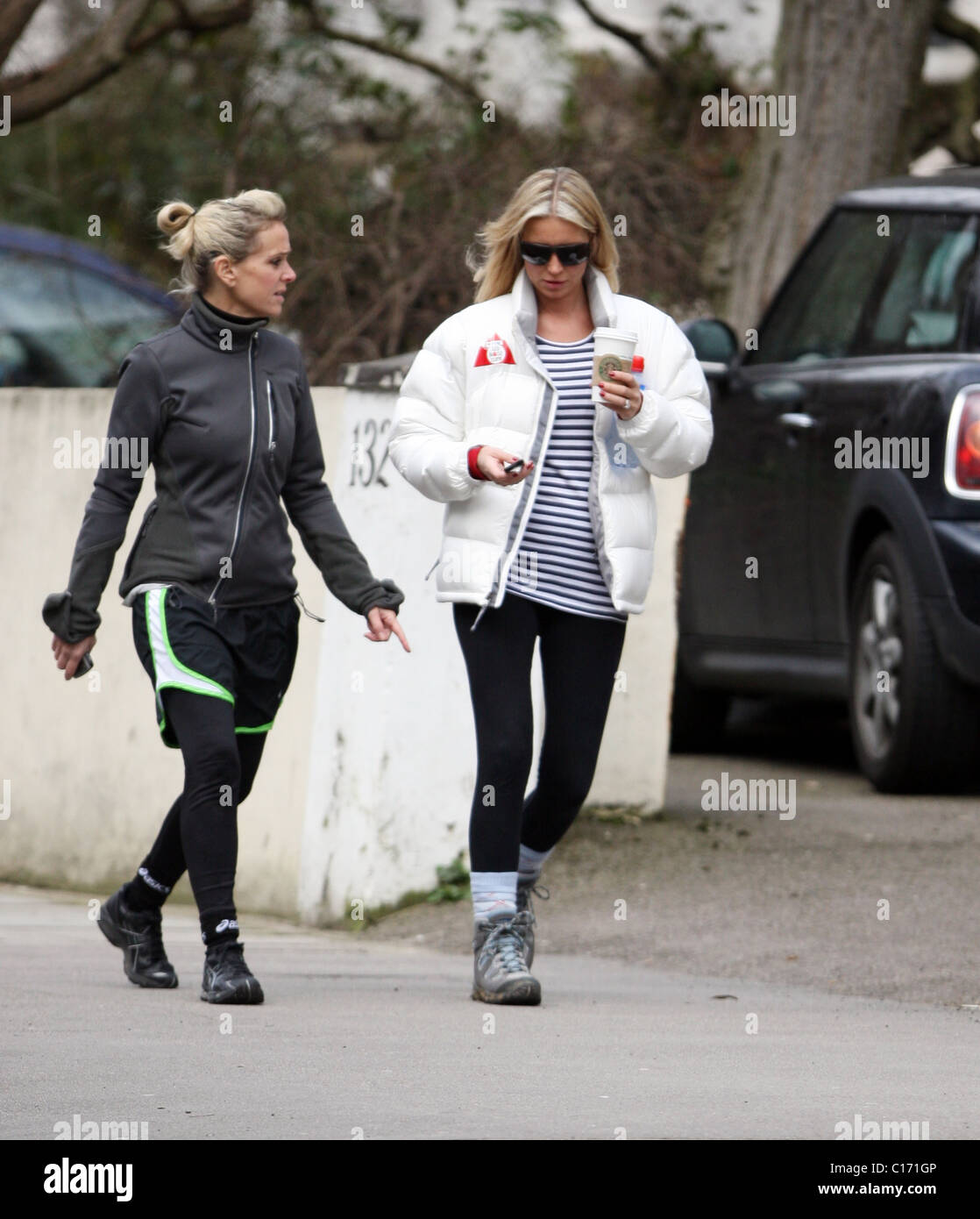 Denise Van Outen goes for a power walk with her trainer, Nicki Waterman ...