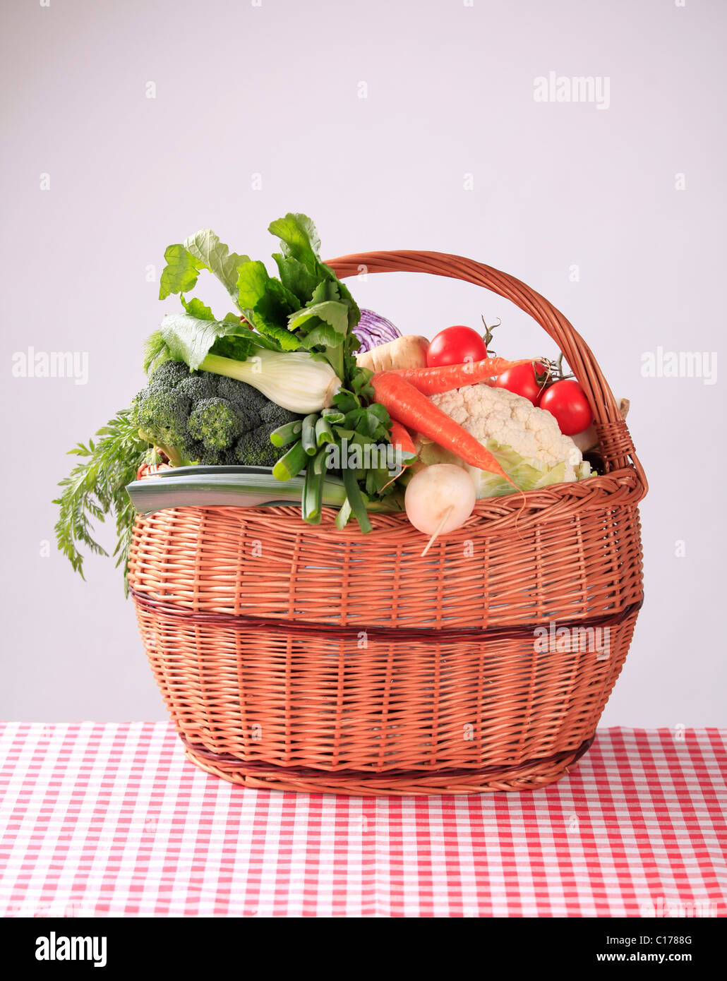 Variety of fresh vegetables in a basket Stock Photo - Alamy