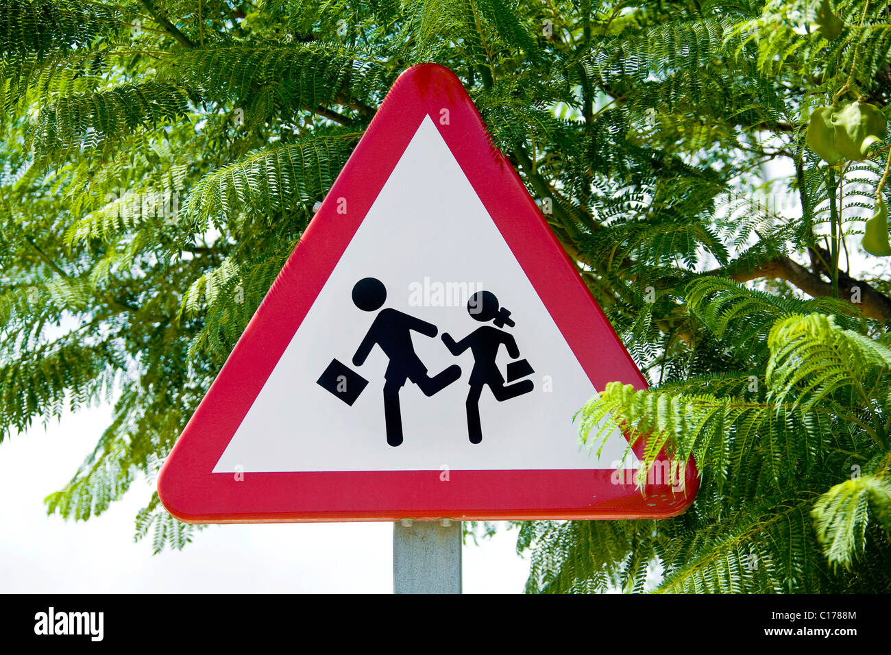 Traffic sign to be mindful of school children Stock Photo - Alamy
