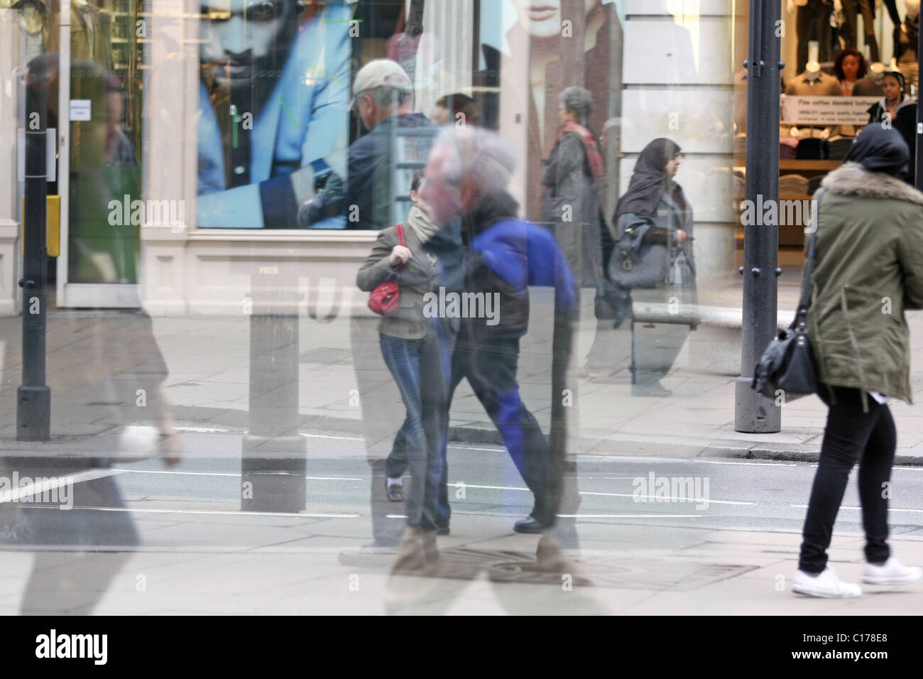 Part of Oxford Street - a view through a shop window overlaid with ...