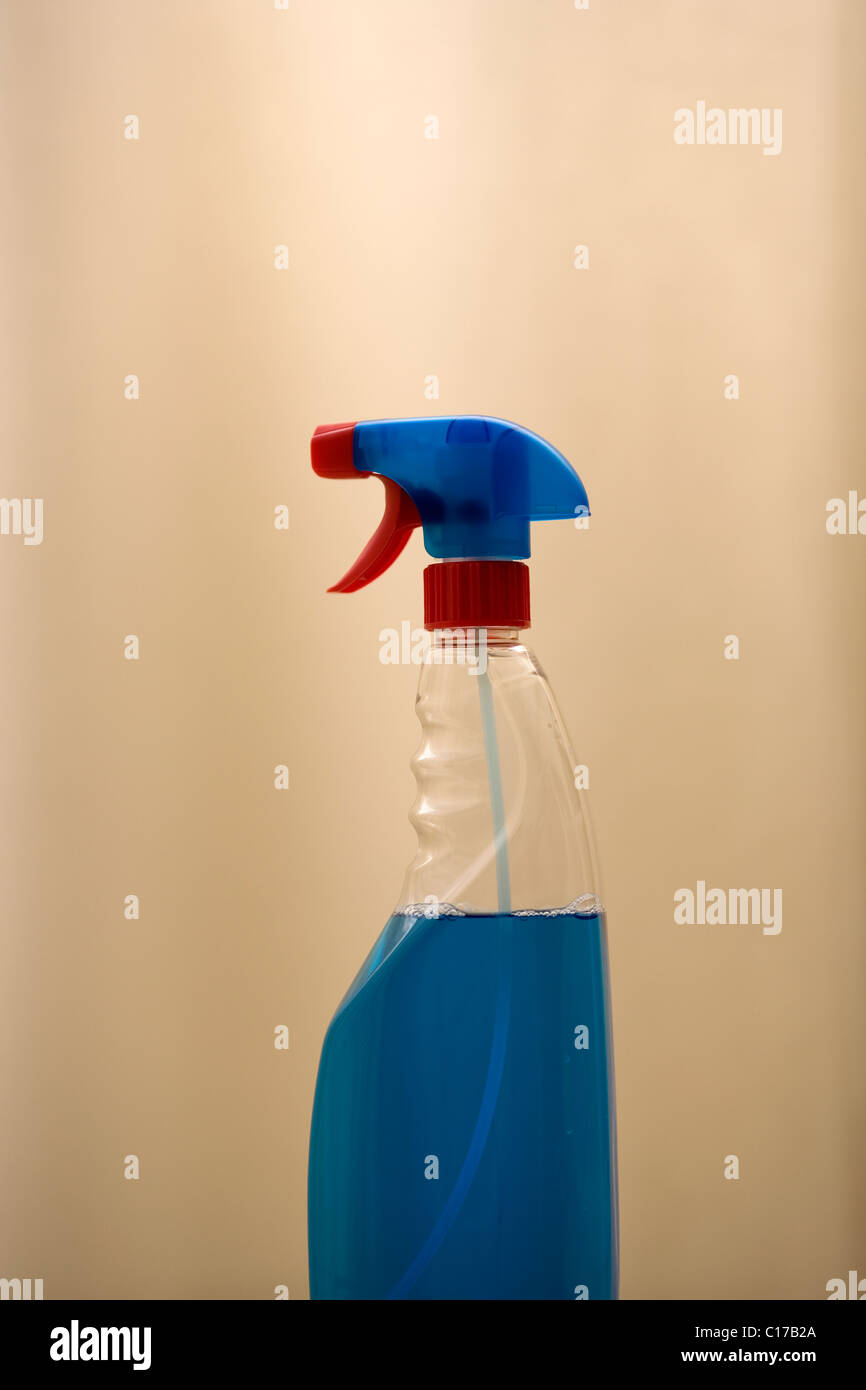 Blue cleaning liquid in clear plastic container Stock Photo - Alamy