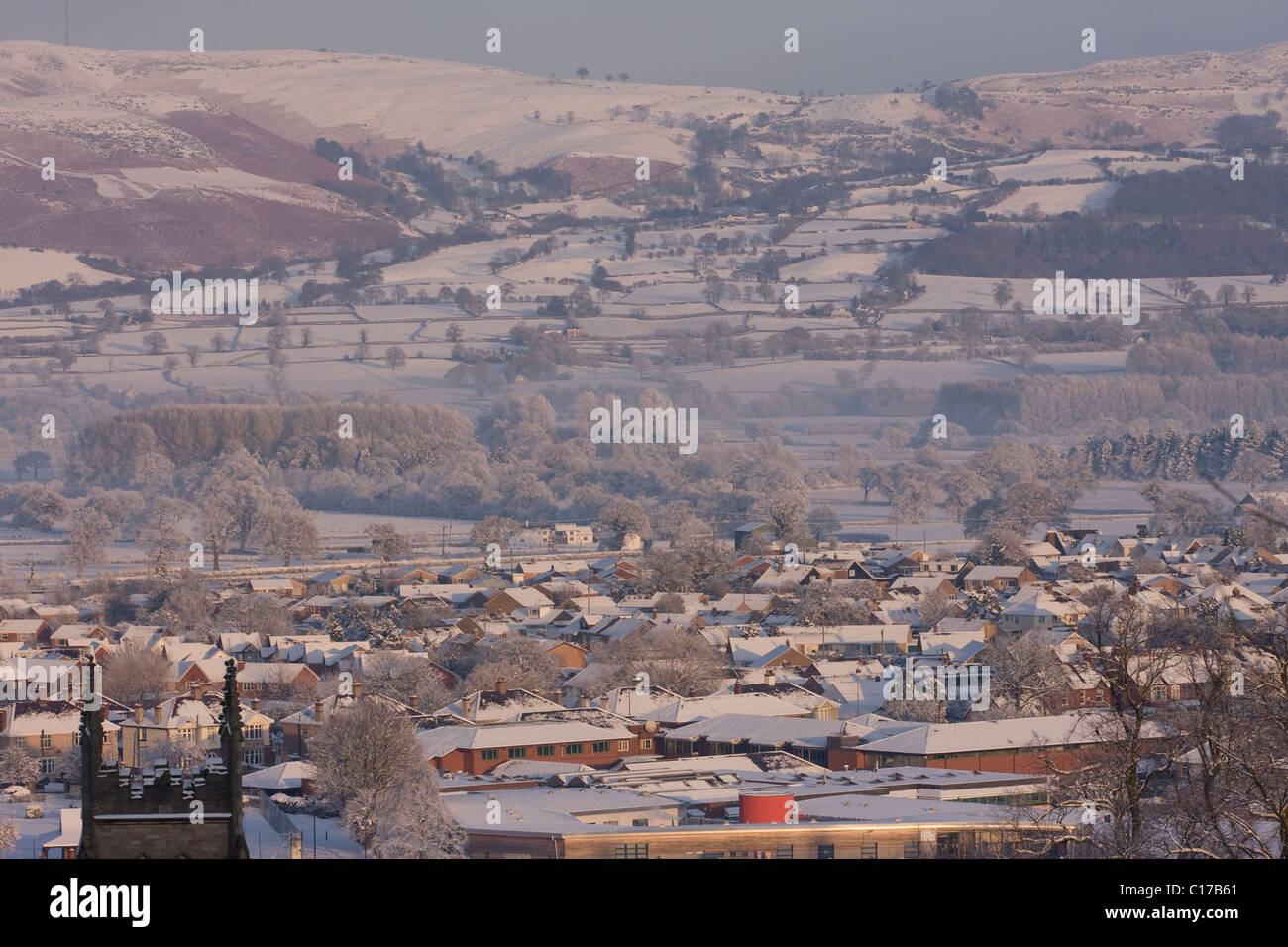 Town and countryside in extreme weather , freezing fog and heavy snow ...
