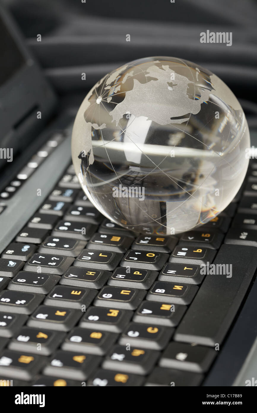 World globe laptop hi-res stock photography and images - Alamy