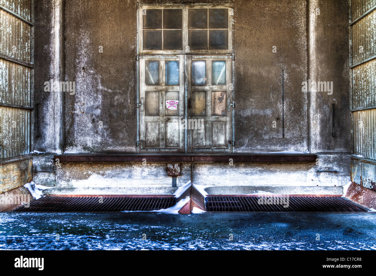 Entrance to old sinister building with snow Stock Photo - Alamy