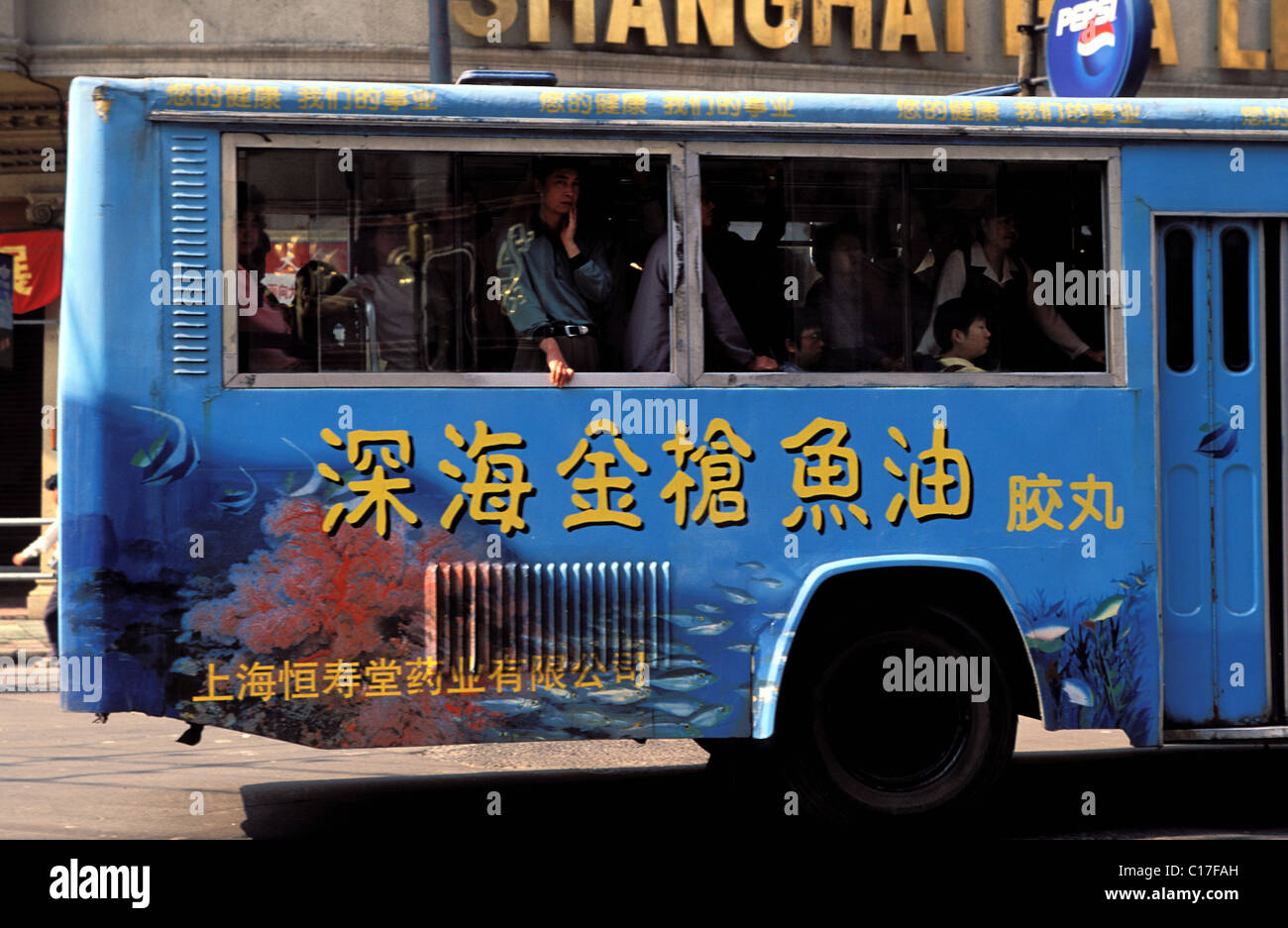 China, Shanghai, Bus painted in the effigy of a local brand ...