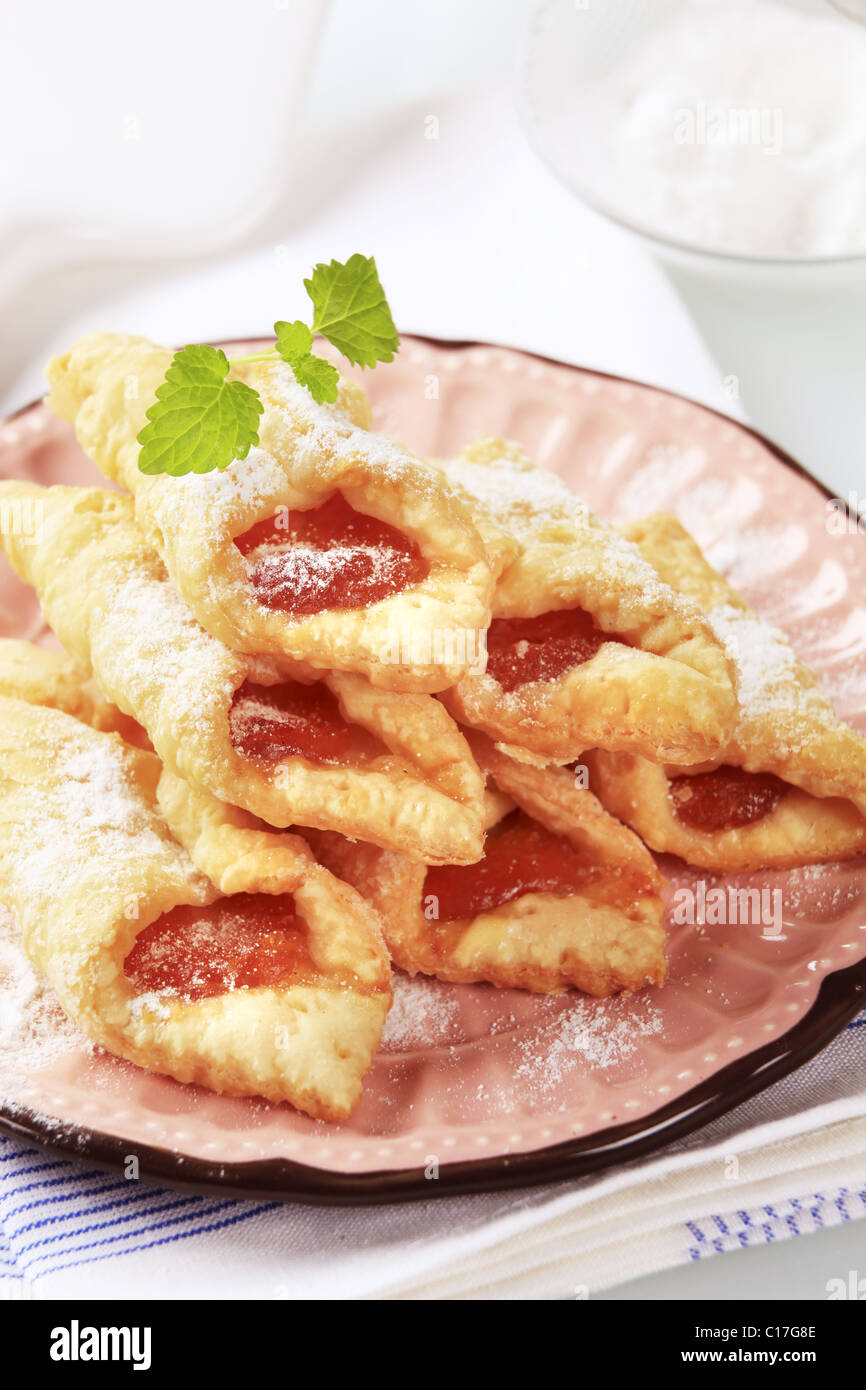 Pile of jam filled crispy pastries on a plate Stock Photo - Alamy