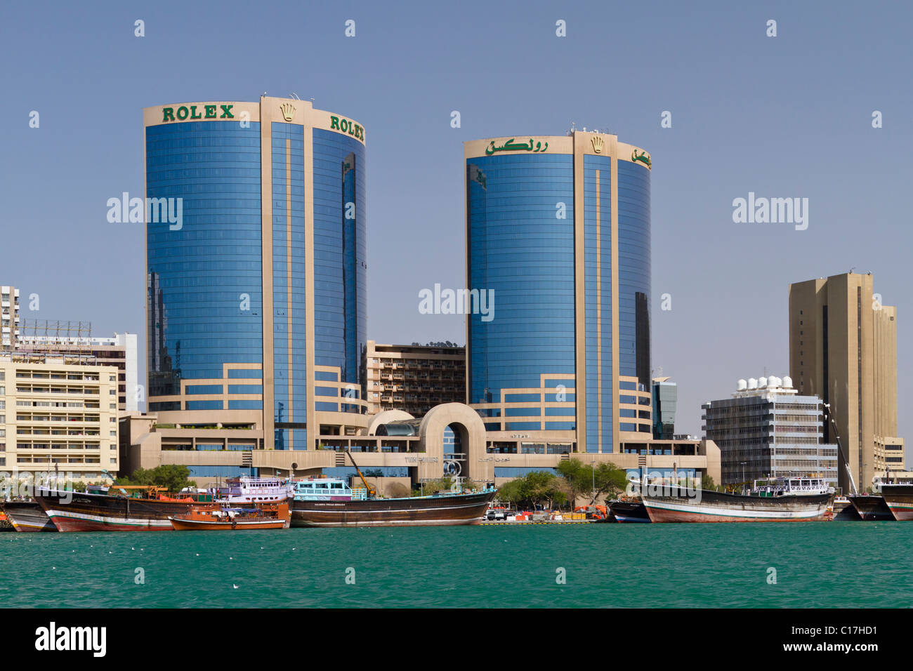 The Dubai Creek skyline with wooden Dow boats in Dubai, UAE Stock Photo ...