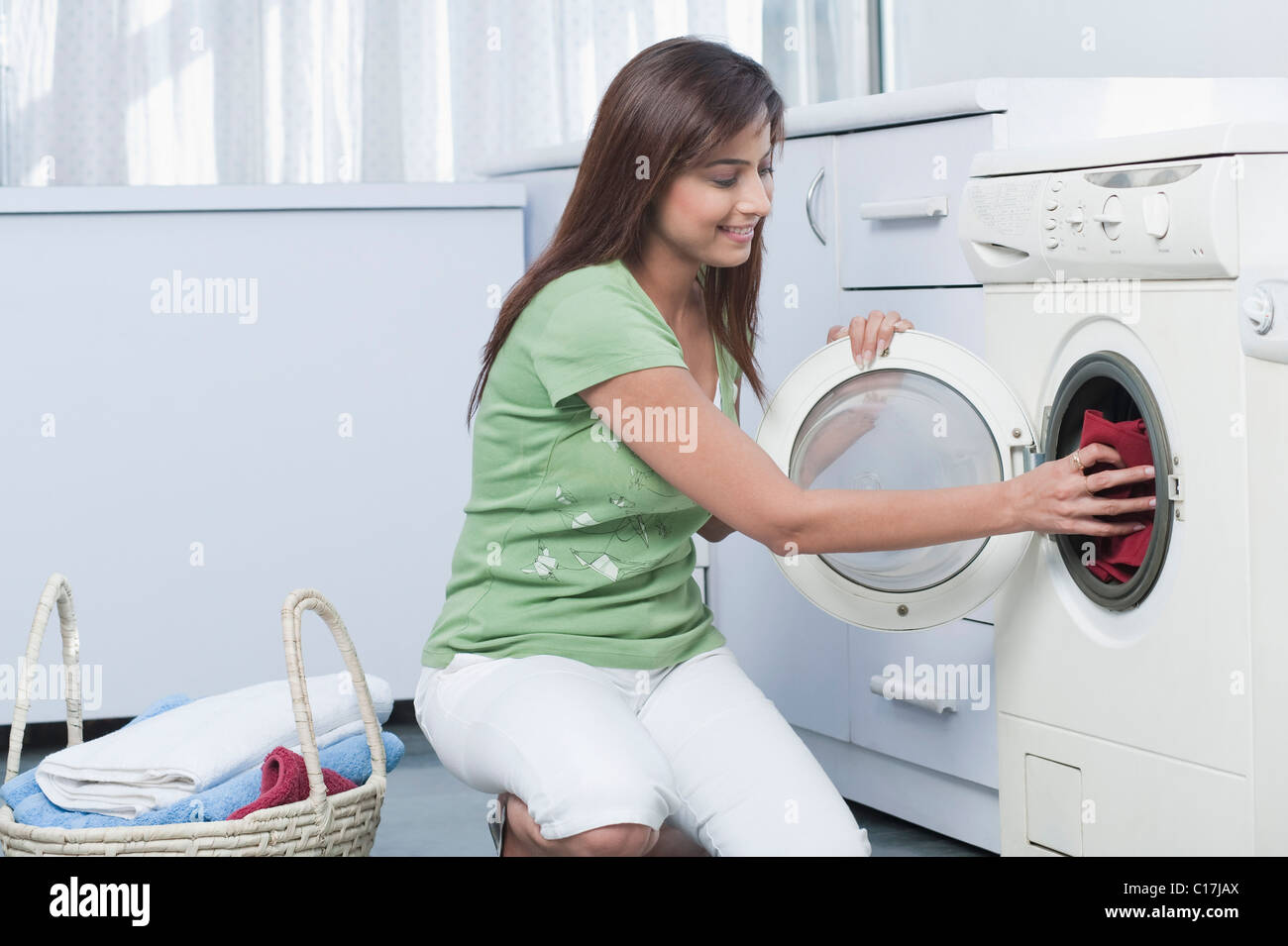 Close-up of a woman doing laundry Stock Photo - Alamy