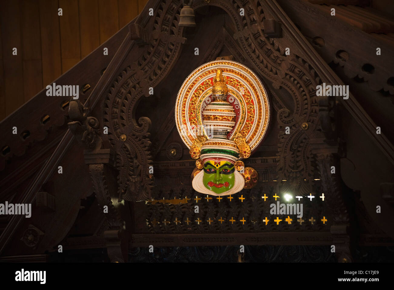 Kathakali mask hanging with a wooden frame, Kochi, Kerala, India Stock ...