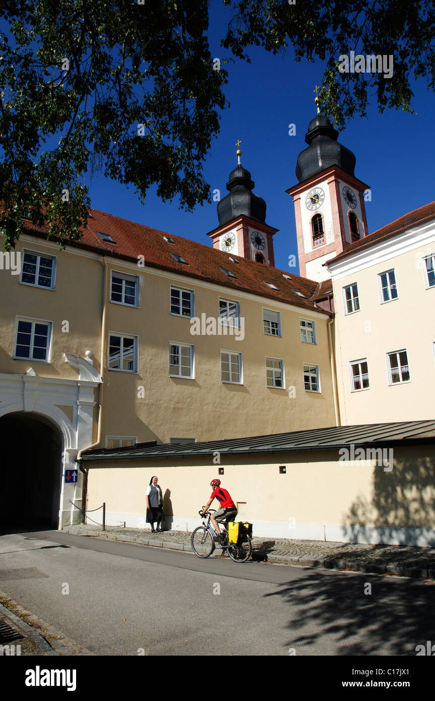 Kloster Au, monastery, bicyclist and nun in front of it, Gars am Inn ...
