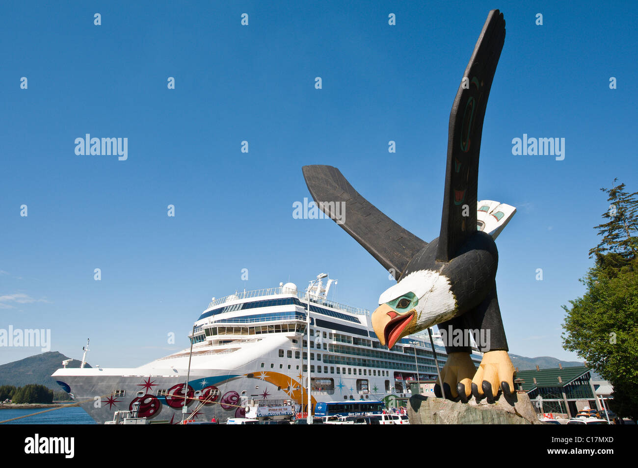 Ketchikan, Alaska. Cruise ship and Bald eagle totem near cruise ...