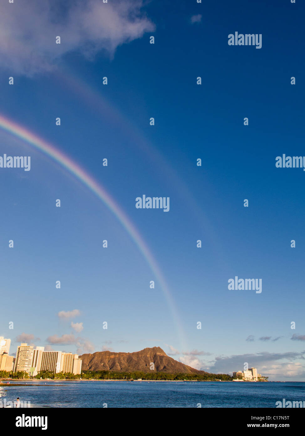 Rainbow at Waikiki over Diamond Head crater Stock Photo - Alamy