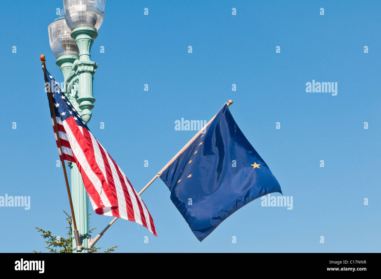 Ketchikan, Alaska. USA and Alaskan flags Ketchikan, Southeast Alaska ...