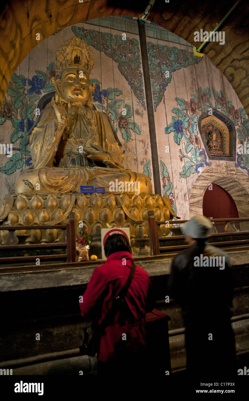 People praying inside Buddhist Temple in Summer Palace, Beijing, China ...