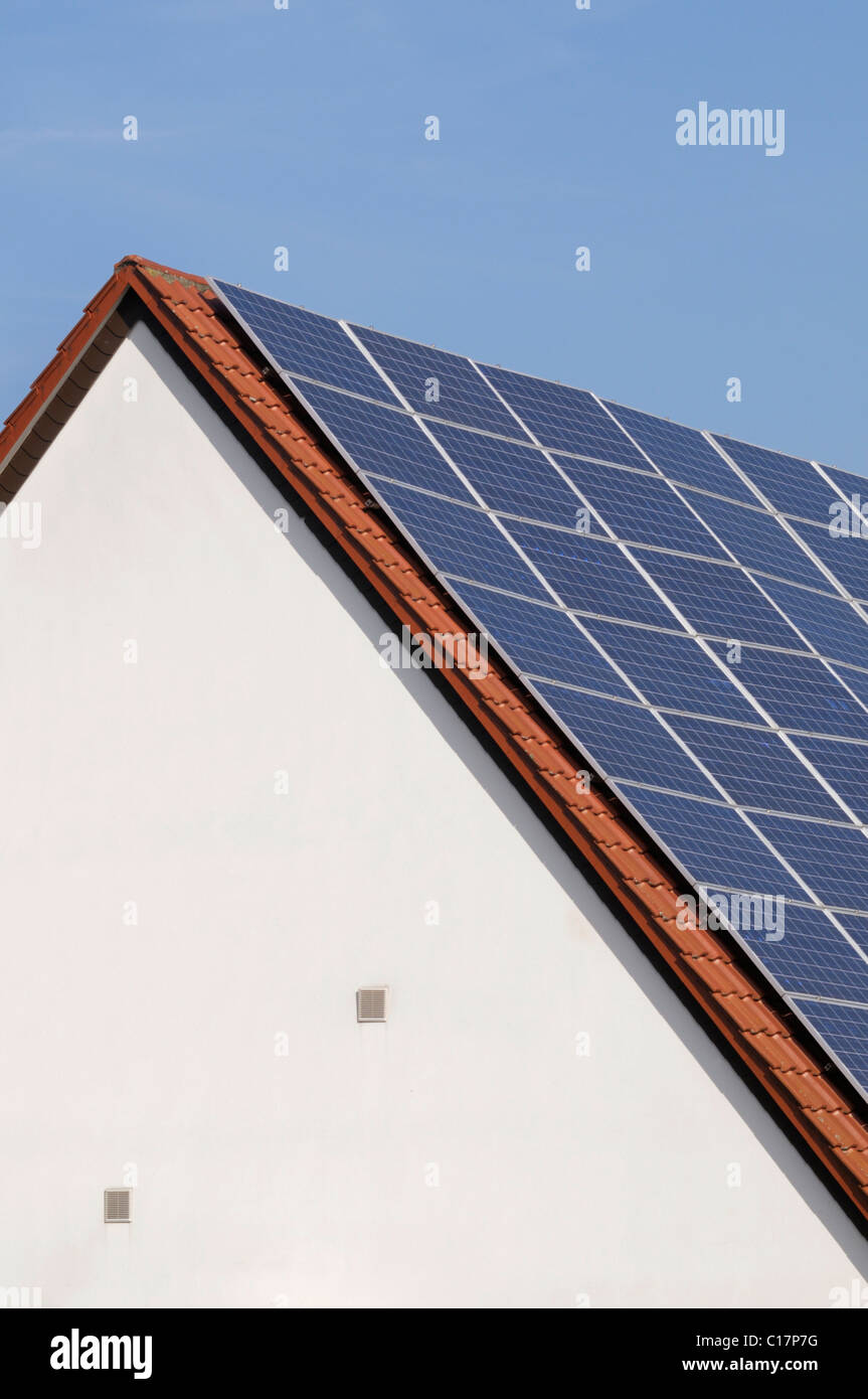 Solar collectors on a roof Stock Photo - Alamy