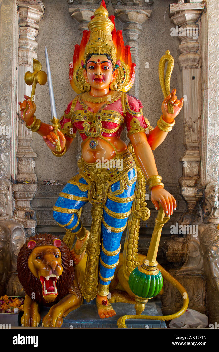 Hindu Goddess Durga on Lion with Trident in Temple Stock Photo - Alamy