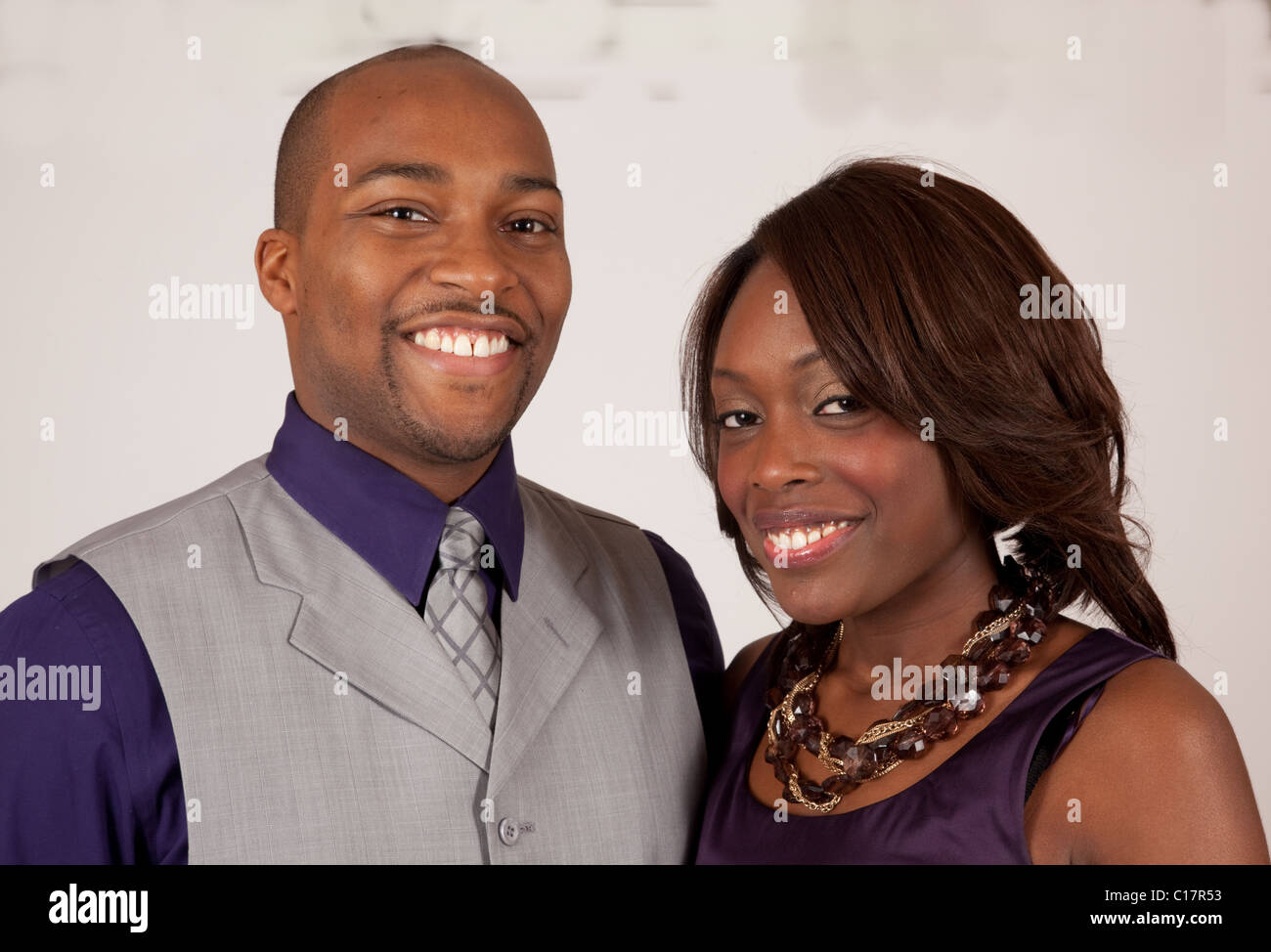 Happy African American couple in a romantic posture and big smiles of ...