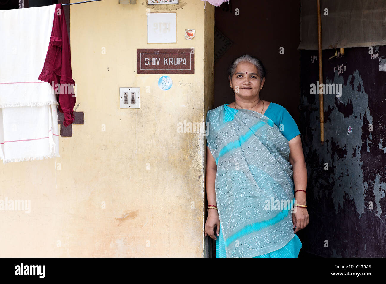 Portrait of Keralite woman in doorway, Kerala, India Stock Photo - Alamy