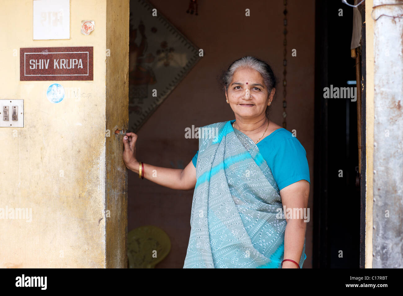 Portrait of Keralite woman in doorway, Kerala, India Stock Photo - Alamy