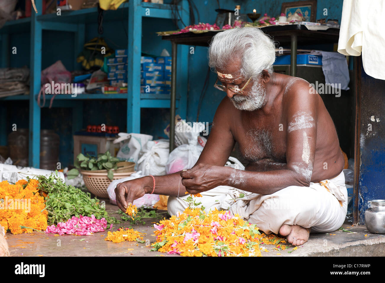 Garland maker, Fort Cochin, Kerala, India Stock Photo - Alamy