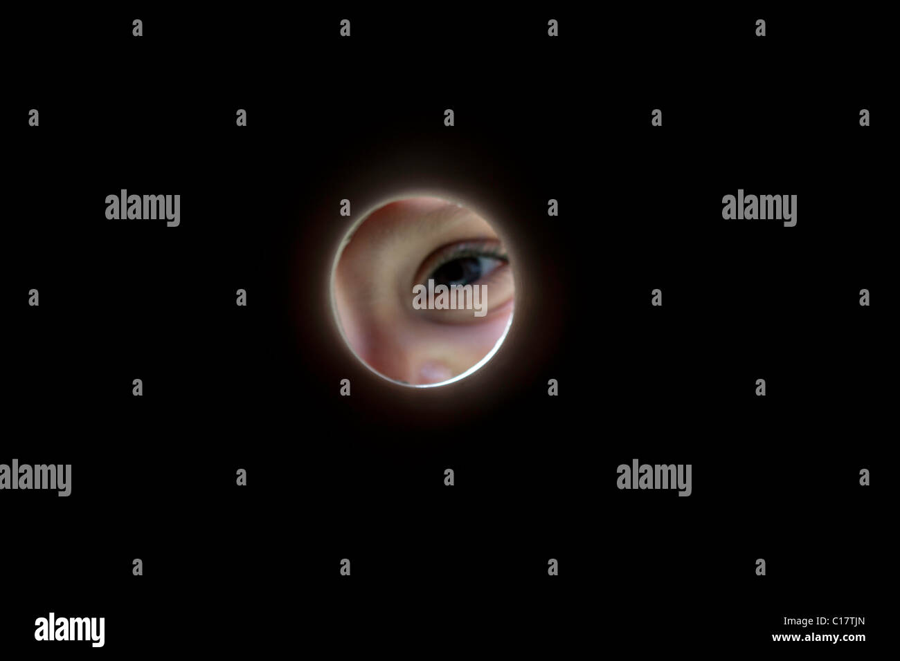 Eye looking through a tube hi-res stock photography and images - Alamy