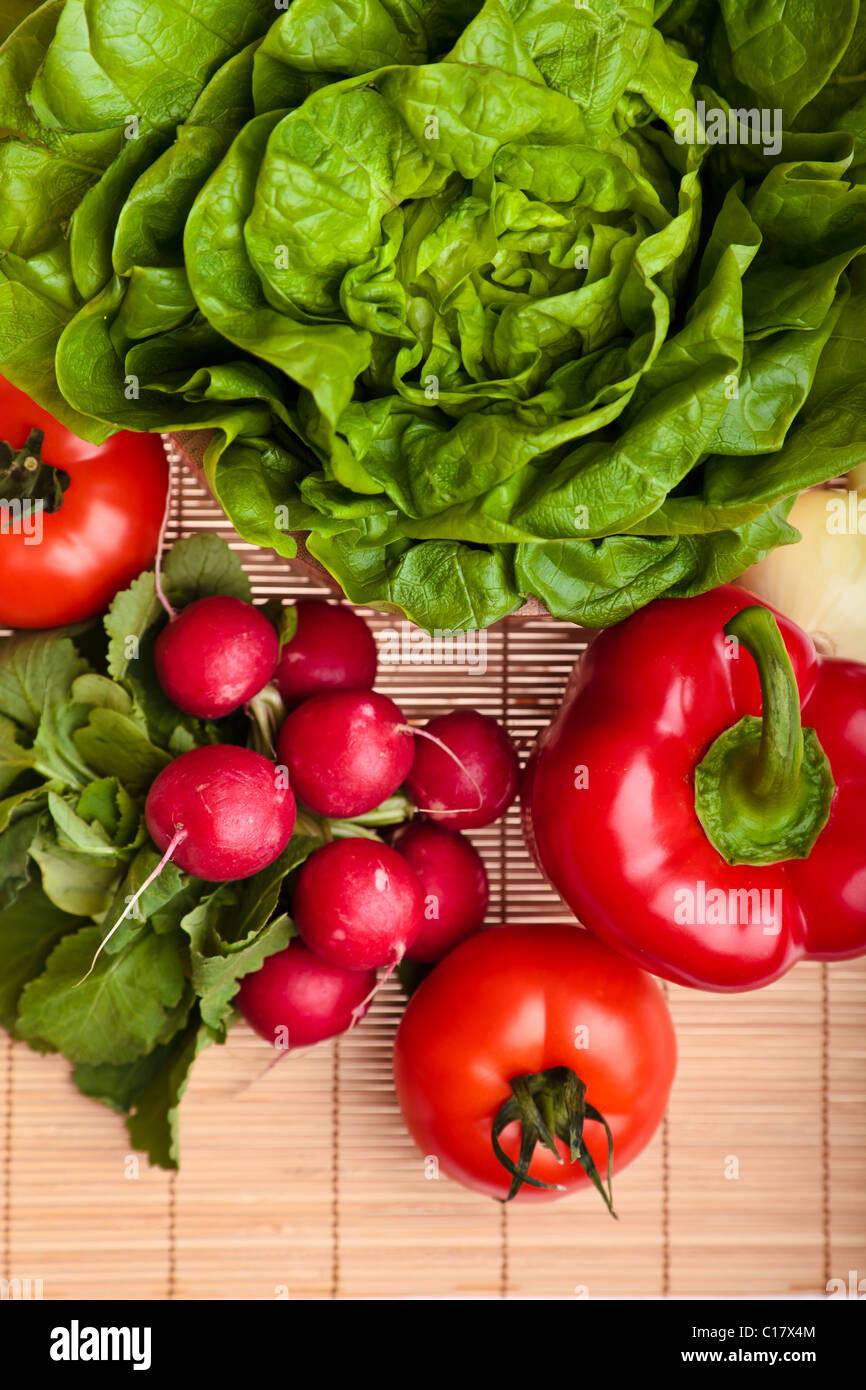Composition of fresh vegetables on bamboo plate Stock Photo - Alamy