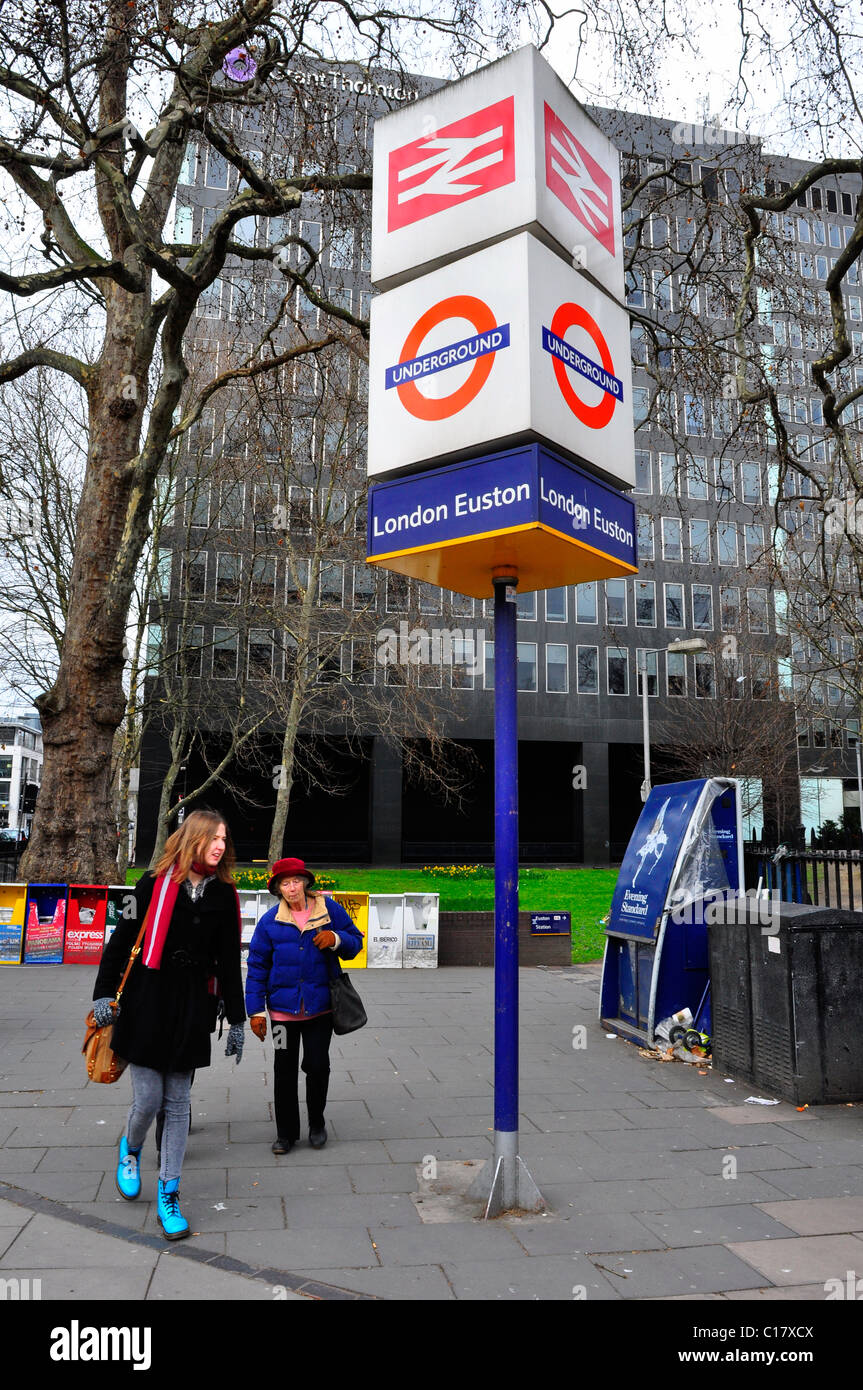 Euston Railway & Underground Station Sign with women walking past Stock ...