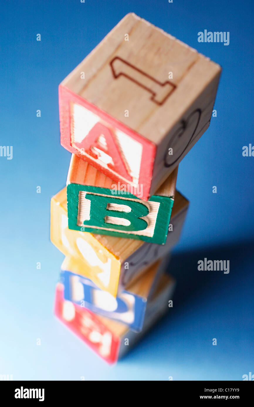 Stack of childrens wooden alphabet blocks Stock Photo - Alamy