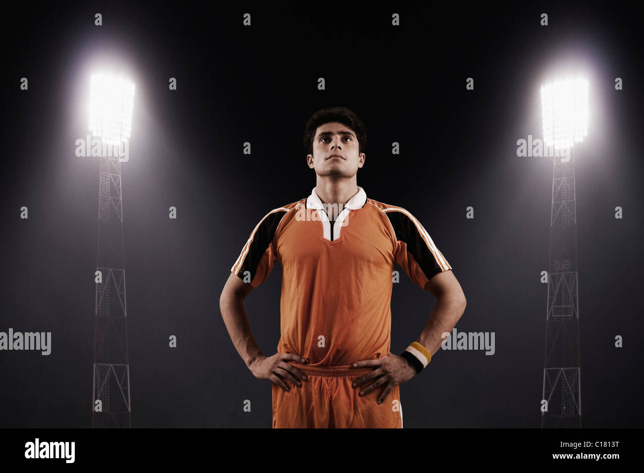 Soccer player standing in the stadium Stock Photo - Alamy