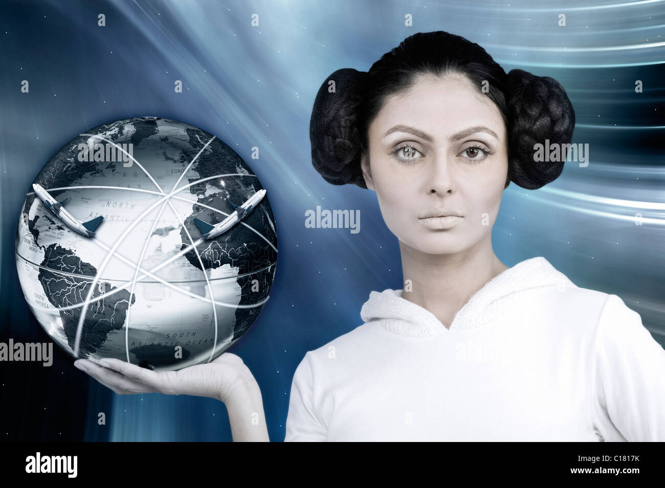 Portrait of a woman holding a globe showing global route Stock Photo ...
